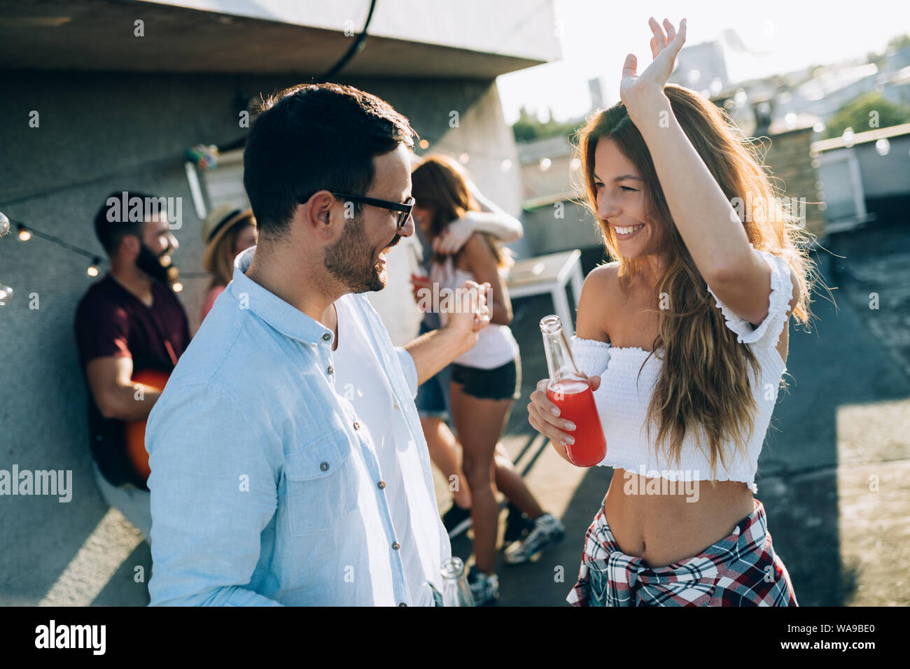 Happy group of young friends having fun in summer Stock Photo - Alamy