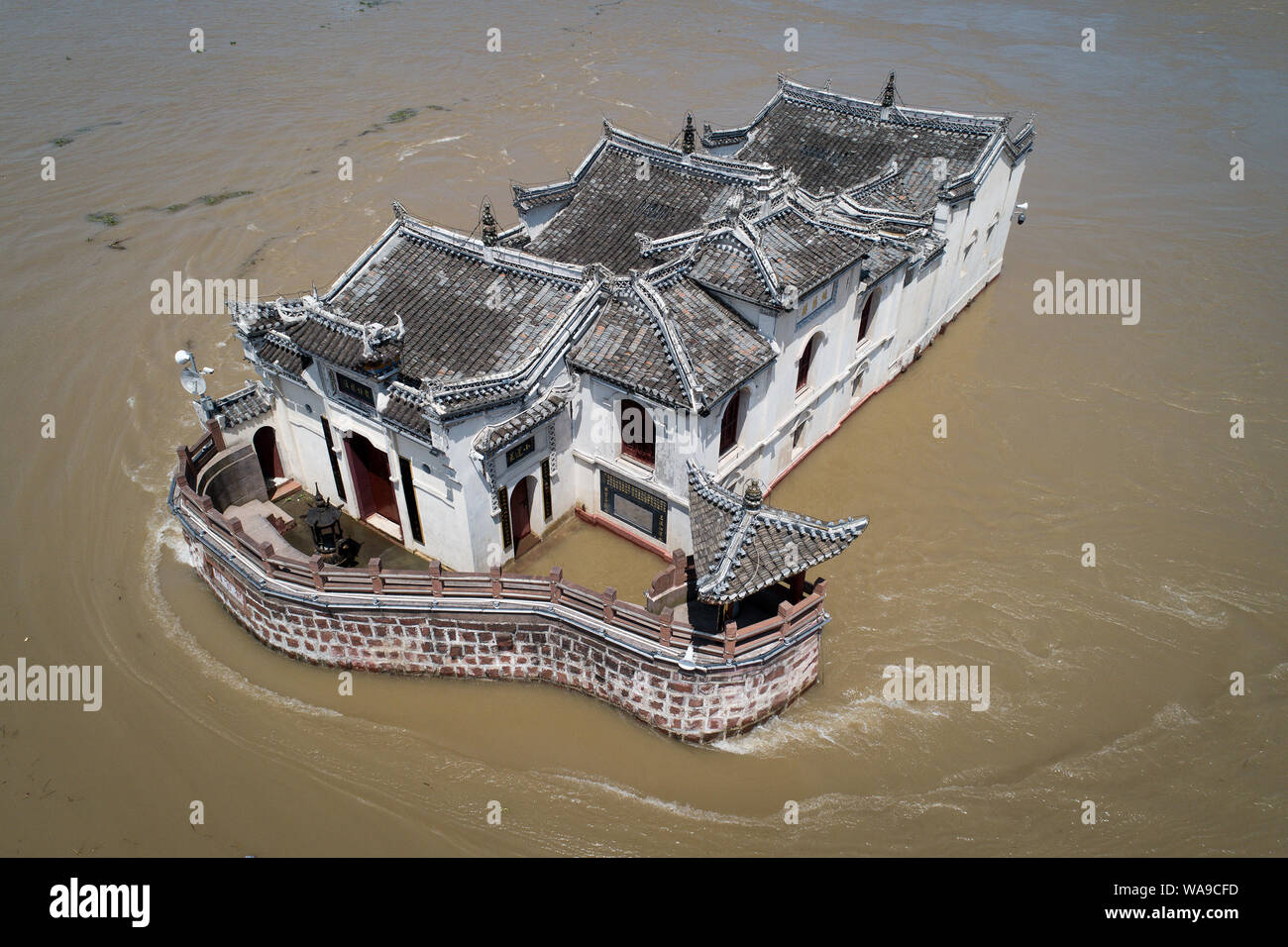View of the 700-year-old Guanyin pavilion, or the Goddess of Mercy Pavilion, surrounded by ...