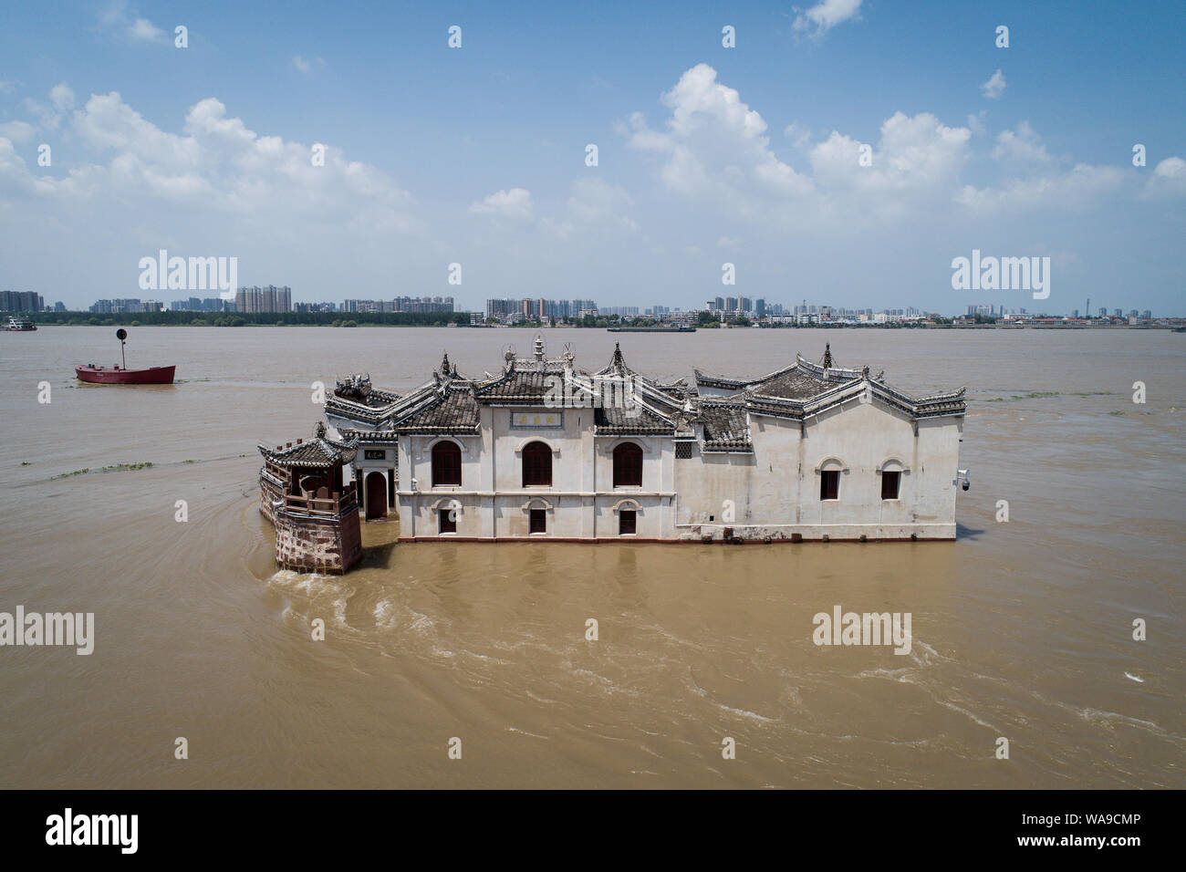 View of the 700-year-old Guanyin pavilion, or the Goddess of Mercy Pavilion, surrounded by ...