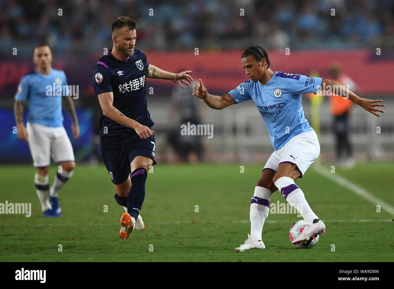 German football player Leroy Sane, right, of Manchester City F.C. of ...