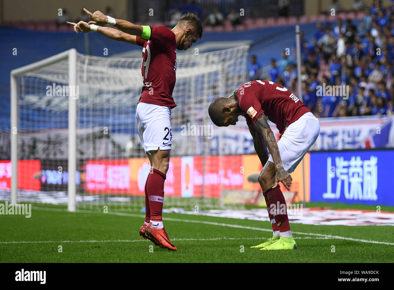 Brazilian football player Luiz Fernando da Silva Monte, right, commonly ...
