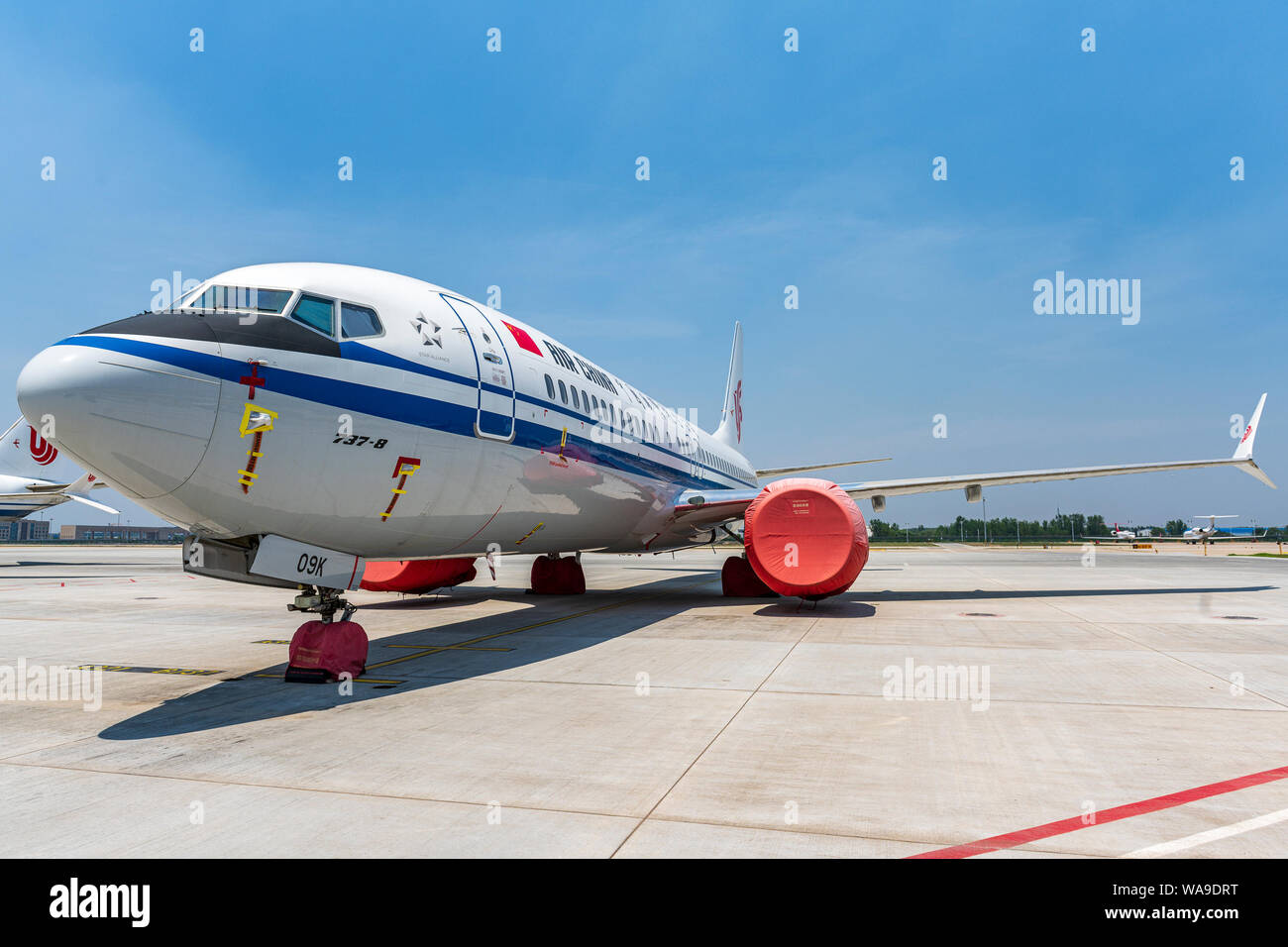 A Boeing 737 Max jet plane of Air China is parked at the Beijing ...
