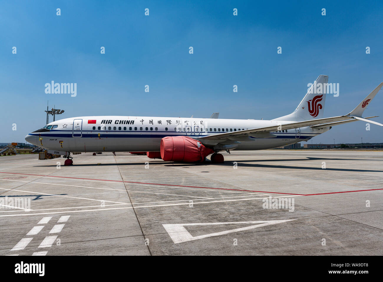 A Boeing 737 Max jet plane of Air China is parked at the Beijing ...