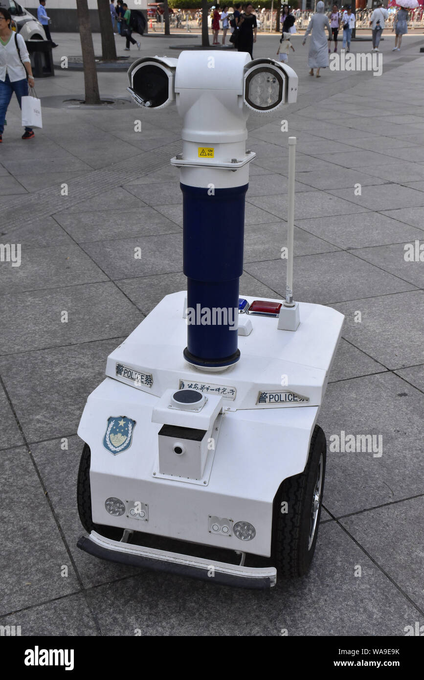 The robot resembling Wall-E in the movie patrolling in the streets of ...