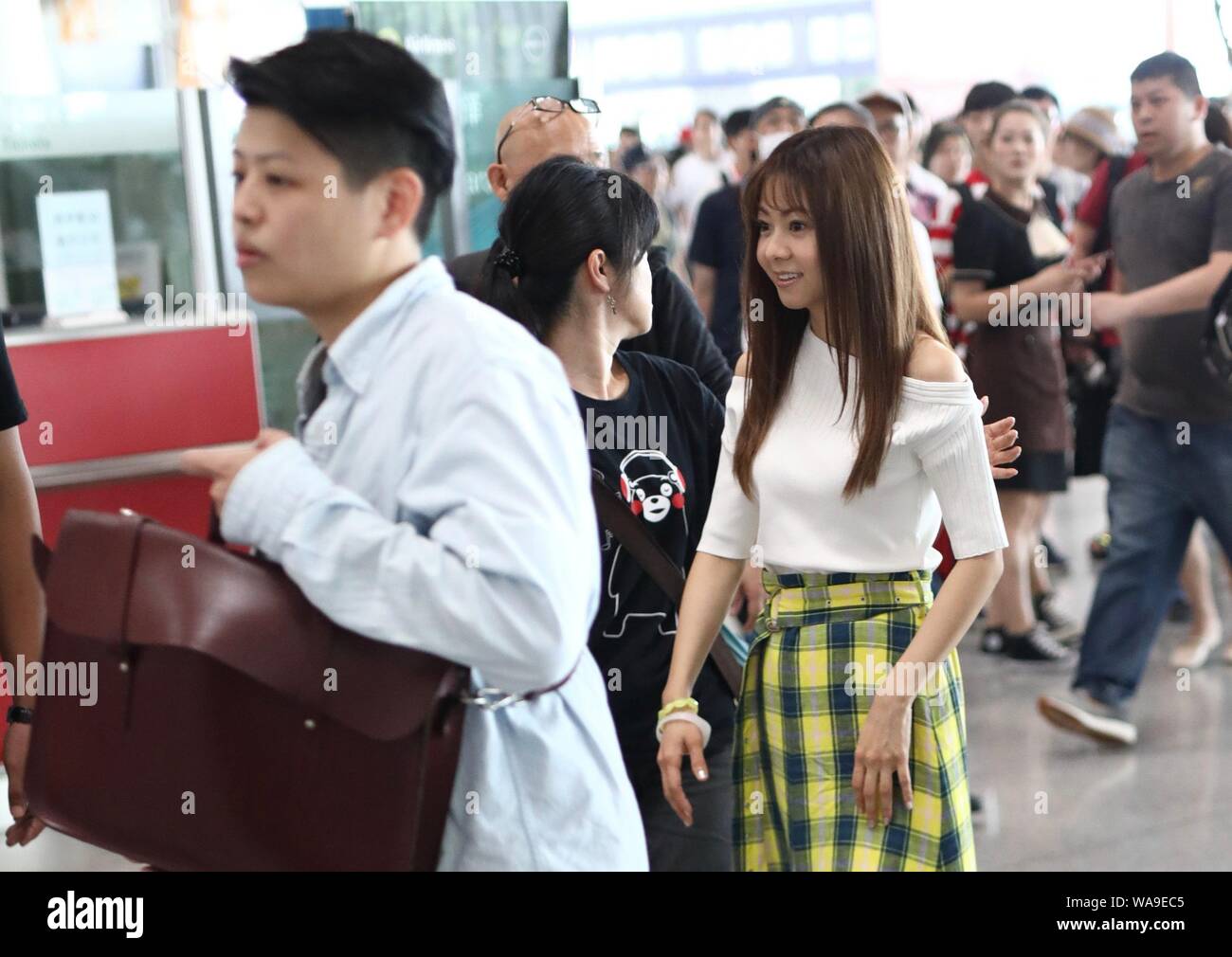Japanese singer Mai Kuraki arrives at the Beijing Capital International ...