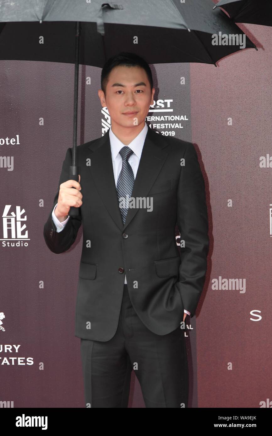 Chinese actor Zhu Yawen poses as he arrives on the red carpet for the ...