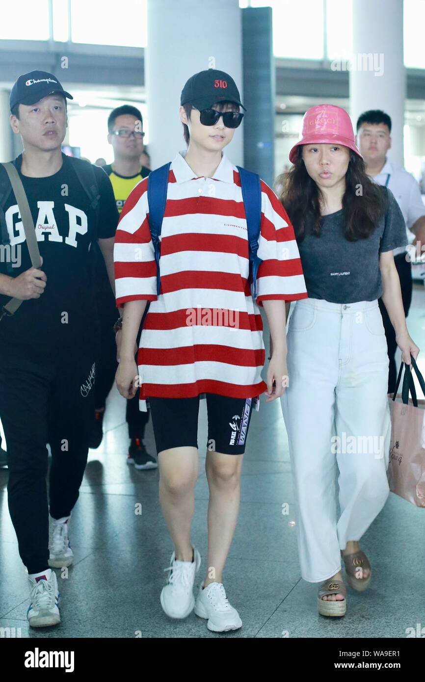 Chinese singer Chris Lee or Li Yuchun arrives at the Beijing Capital ...