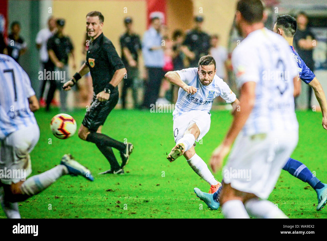 Israeli-Arab football player Dia Saba of Guangzhou R&F shots the ball ...