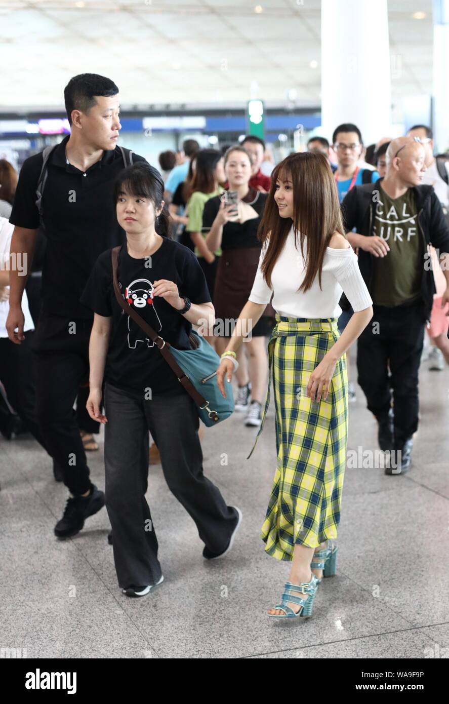 Japanese singer Mai Kuraki arrives at the Beijing Capital International ...