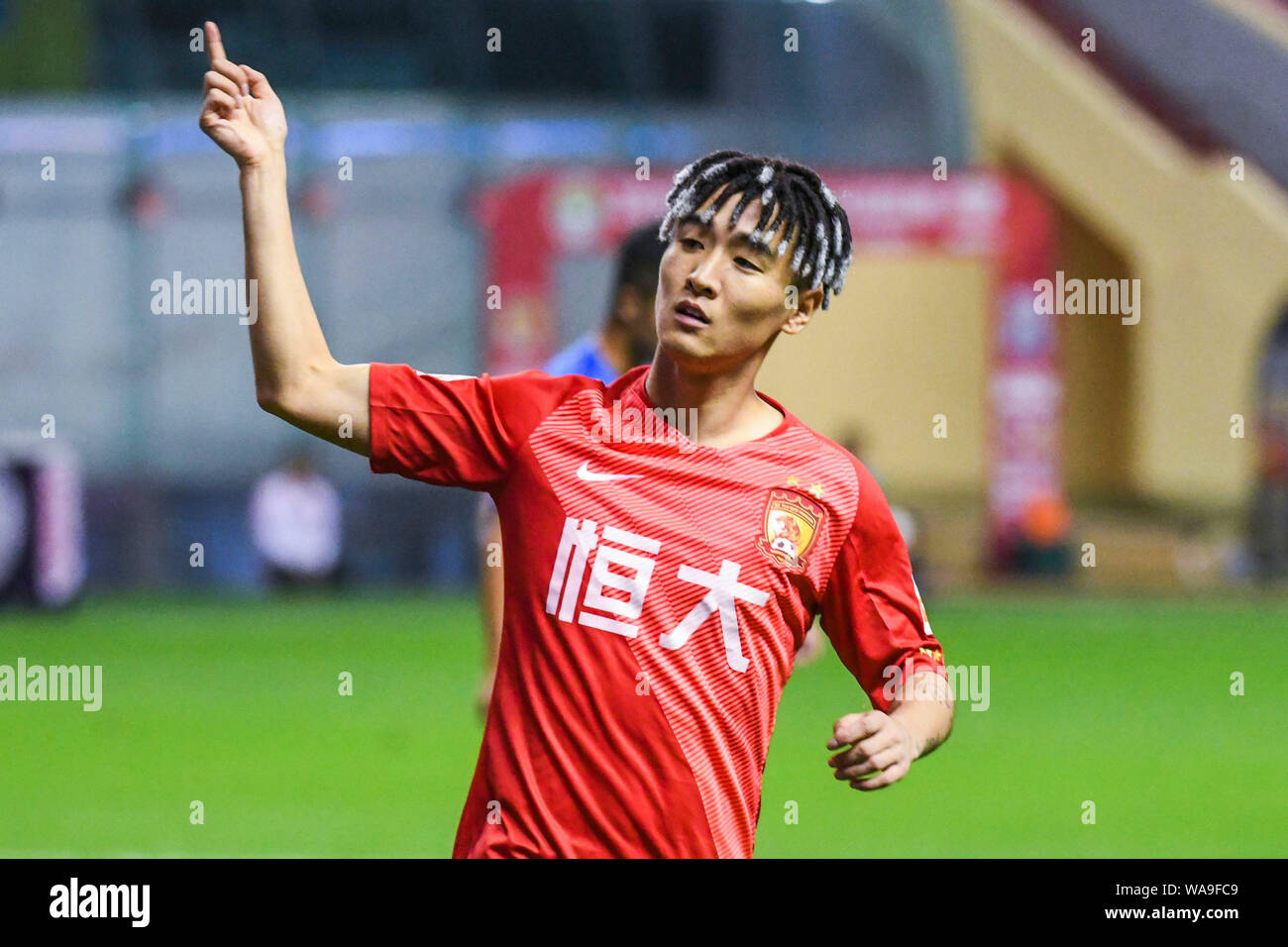 Wei Shihao of Guangzhou Evergrande Taobao celebrates after scoring ...