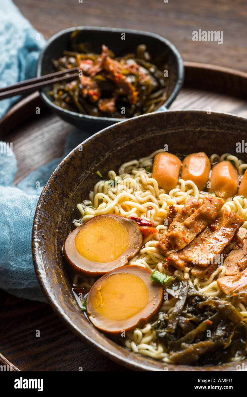 -FILE-Delicious instant noodles with various side dishes in Wuhan ...
