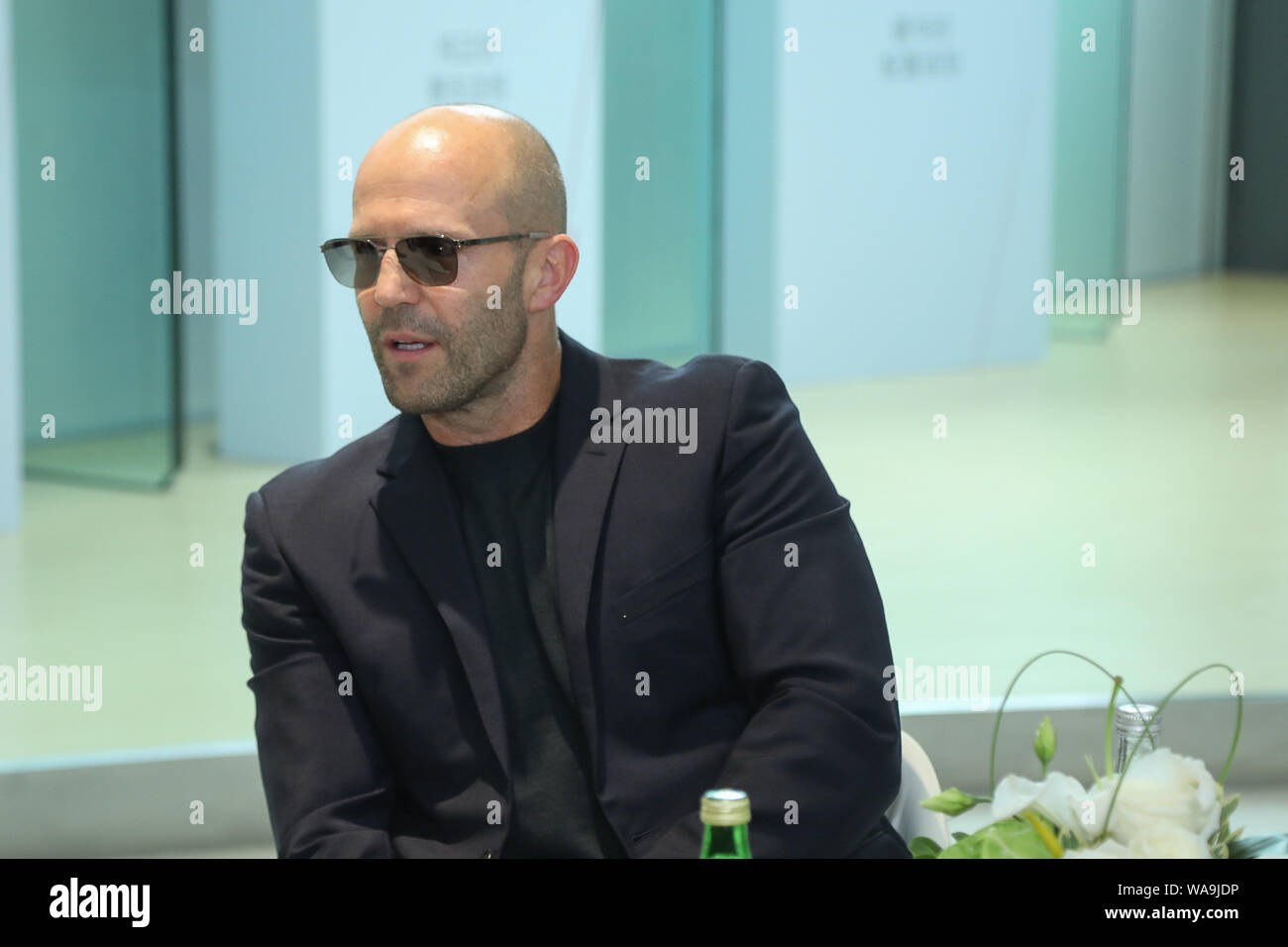 English actor Jason Statham arrives as he visits a dealership store of ...