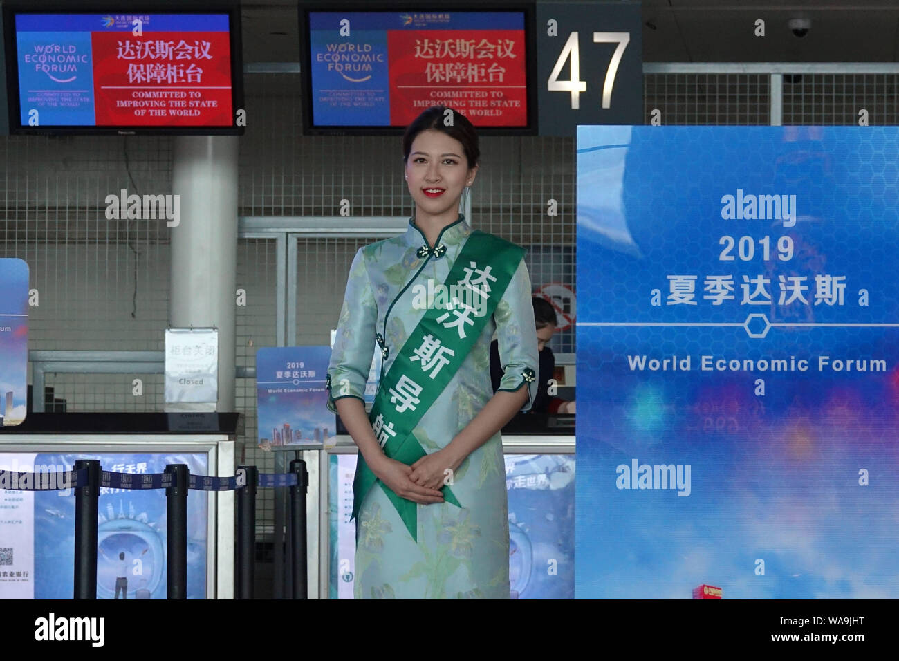 Chinese hostesses dressed in Cheongsam, a traditional Chinese dresses ...