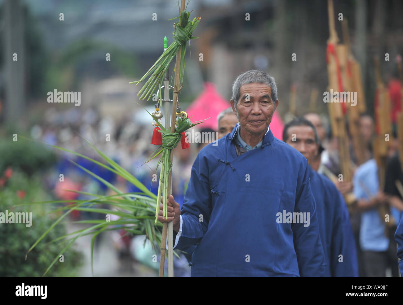 Chinese people of Dong ethnic group wearing traditional costumes and ...