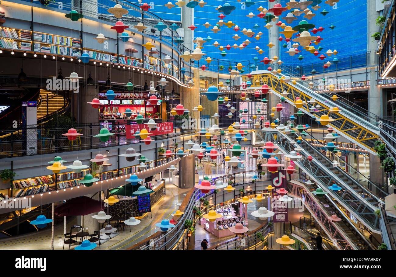 Customers shop at a newly-opened shopping mall decorated with unique ...