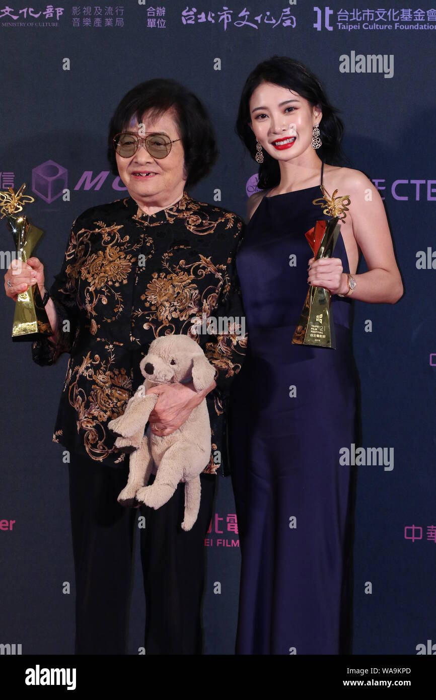Taiwanese actresses Yin-Shang, left, and Li Yi-jie pose with their ...