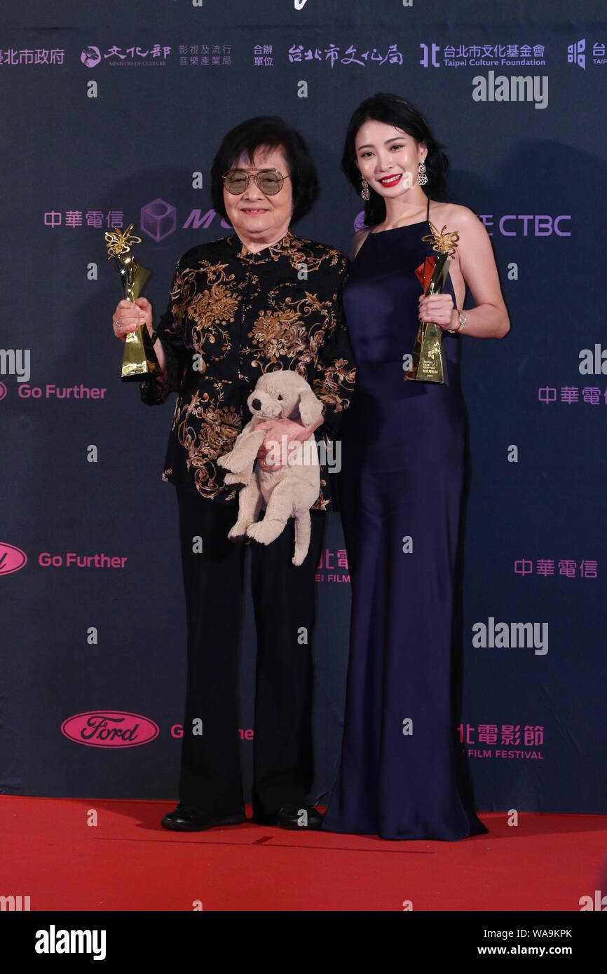 Taiwanese actresses Yin-Shang, left, and Li Yi-jie pose with their ...