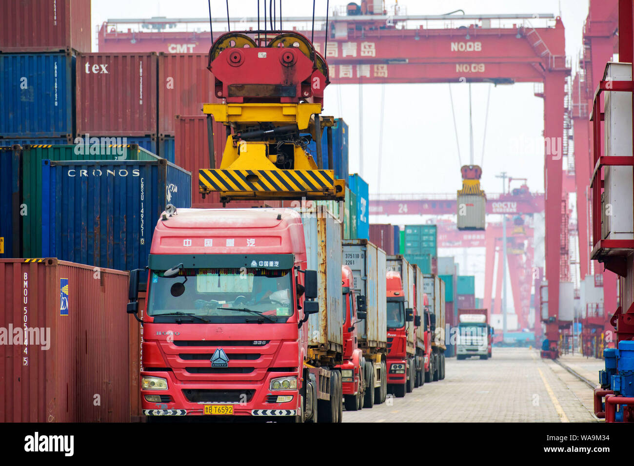 Crane vehicle lifts container hi-res stock photography and images - Alamy