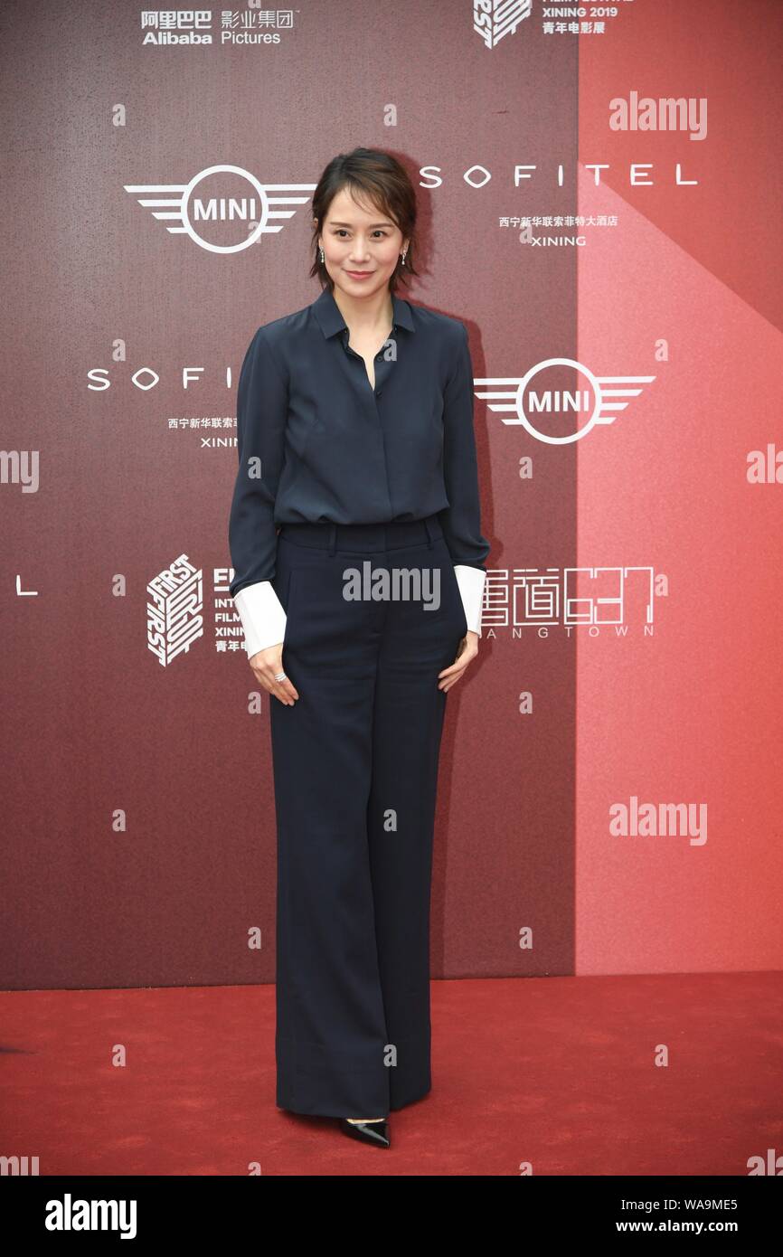 Chinese actress Hai Qing poses as she arrives on the red carpet for the ...