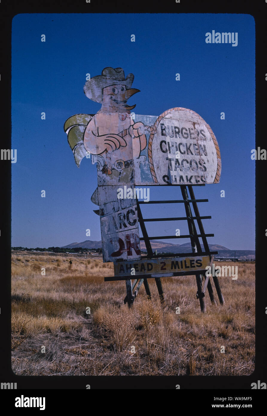 Chicken cowboy billboard wreck, B-80, Elko, Nevada Stock Photo - Alamy