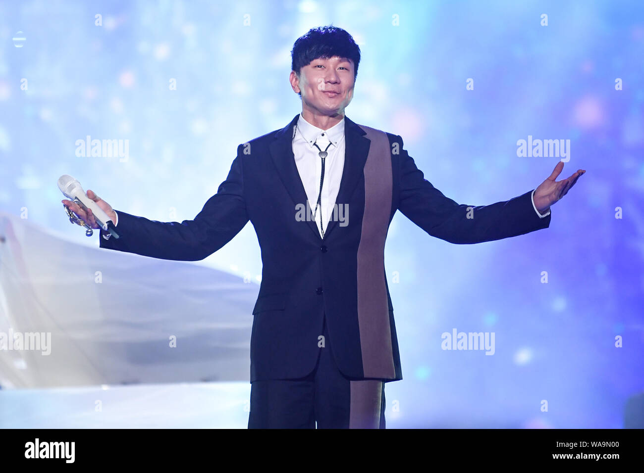 Singaporean singer JJ Lin performs during the opening ceremony for the ...