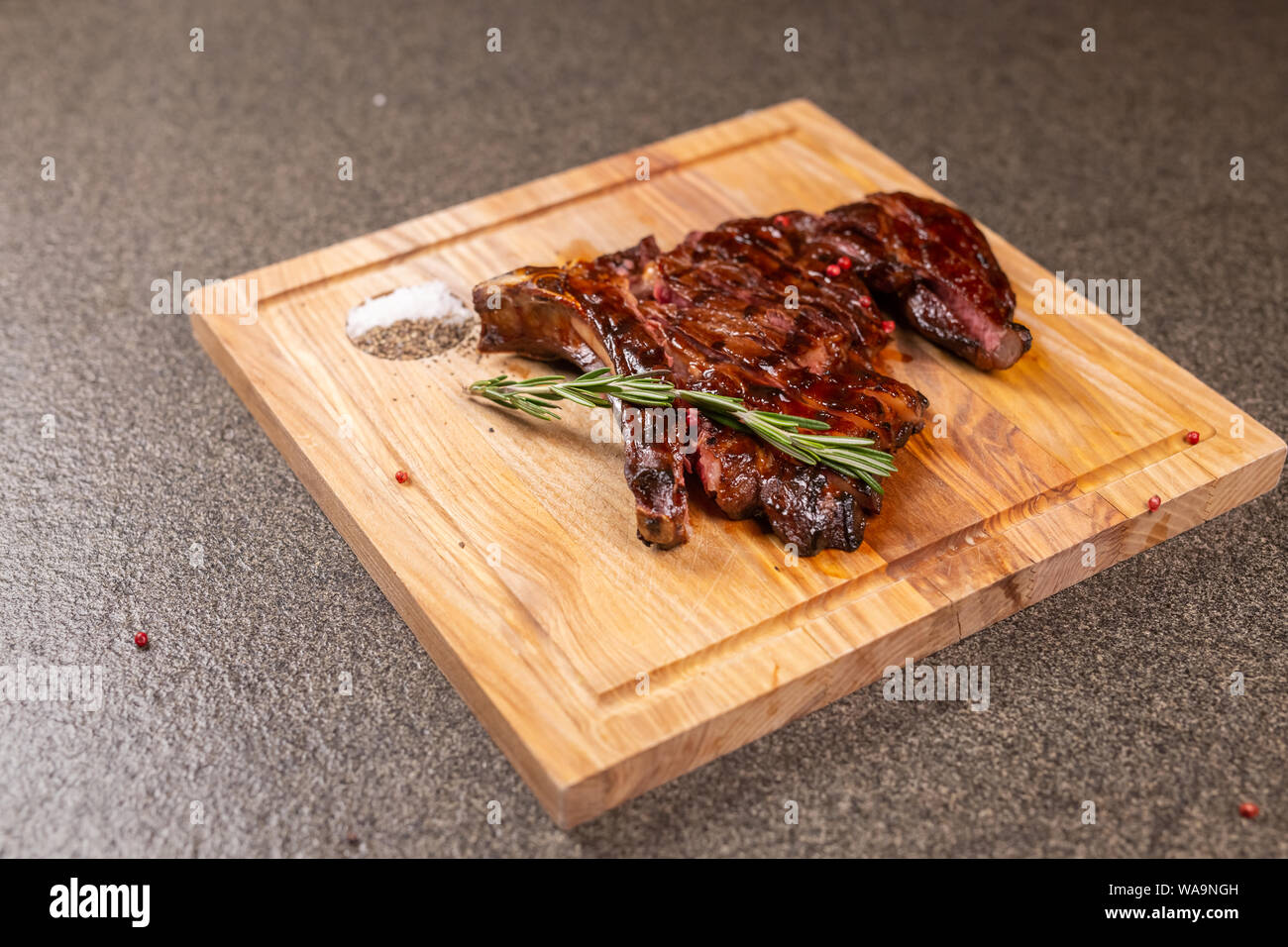 Food, delicious, horse meat and craft concept - serving of grilled ...