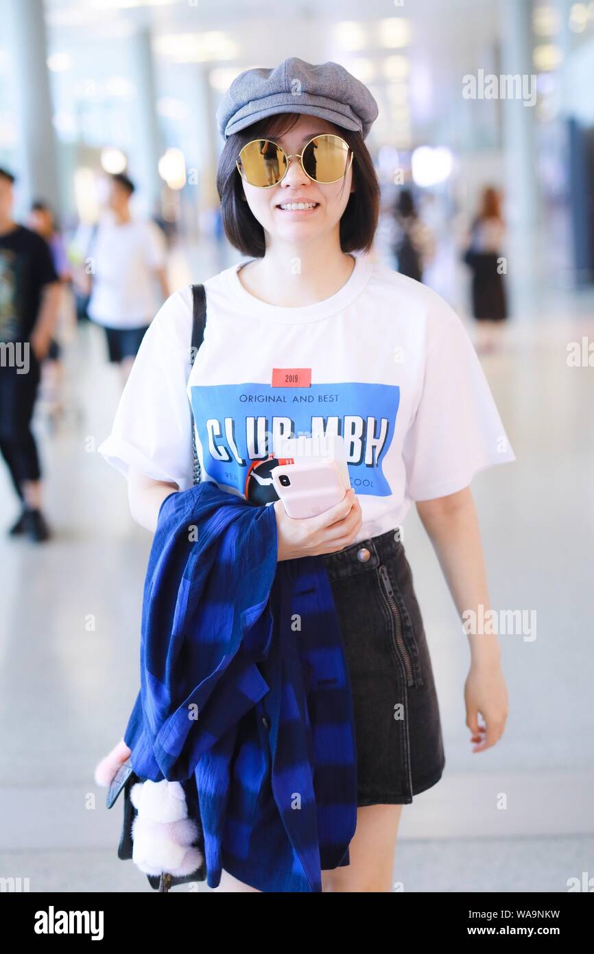 Chinese singer Jane Zhang or Zhang Liangying arrives at an airport ...