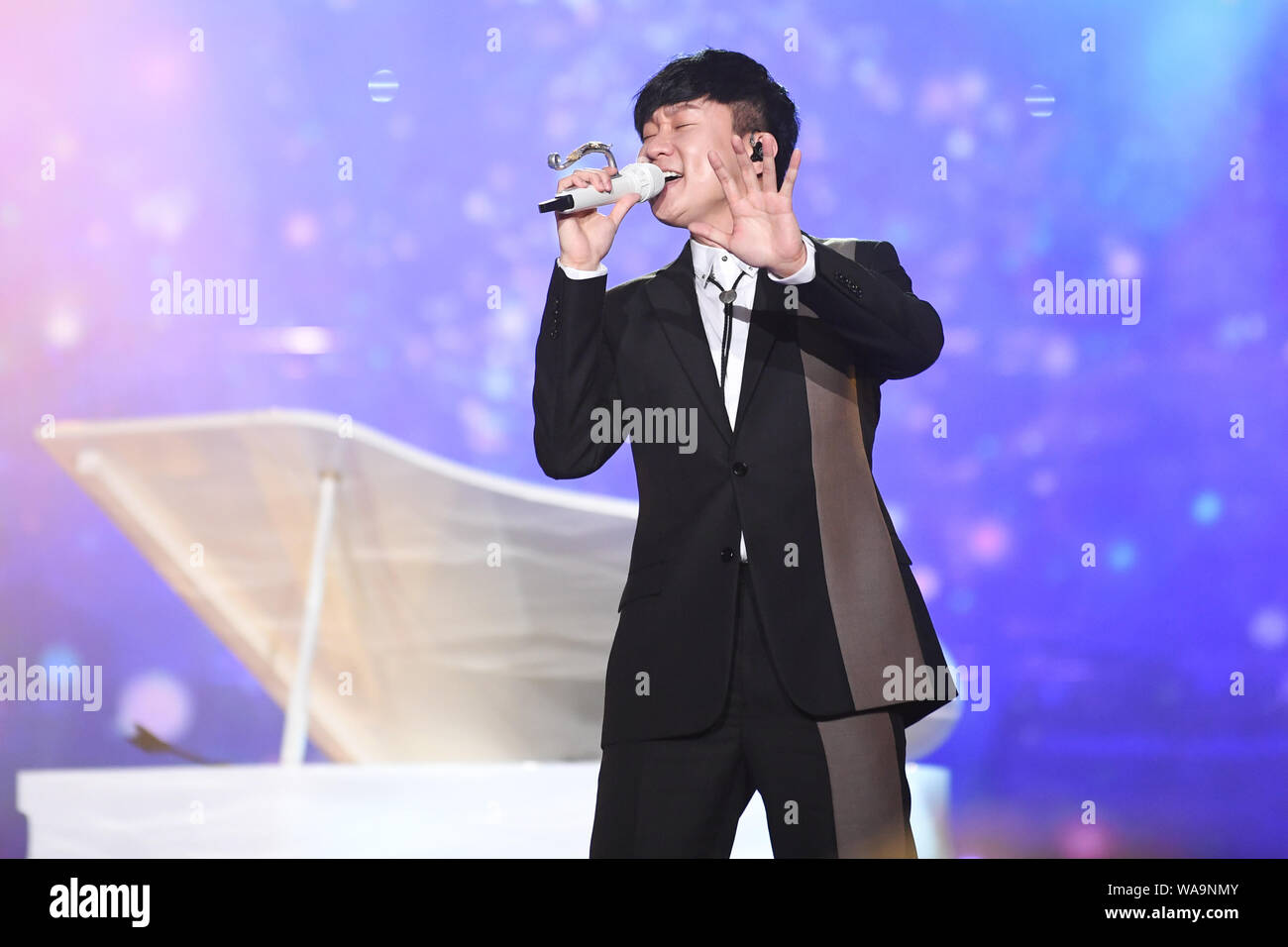 Singaporean singer JJ Lin performs during the opening ceremony for the ...