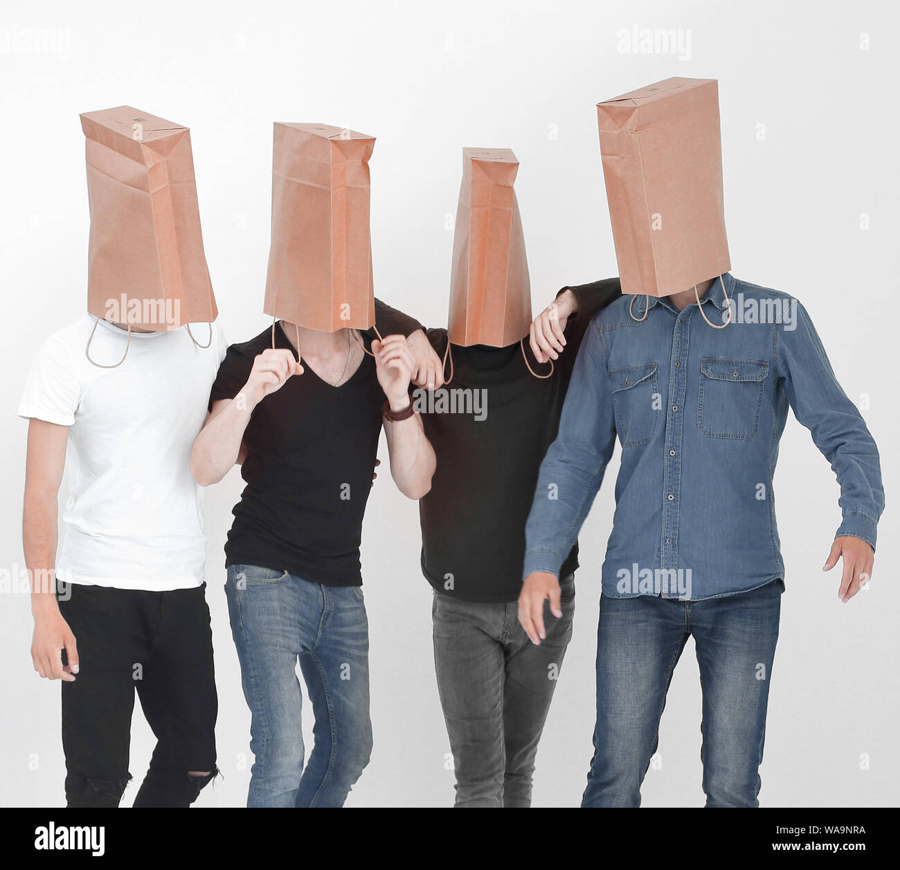 group of young people with paper bags on their heads Stock Photo - Alamy