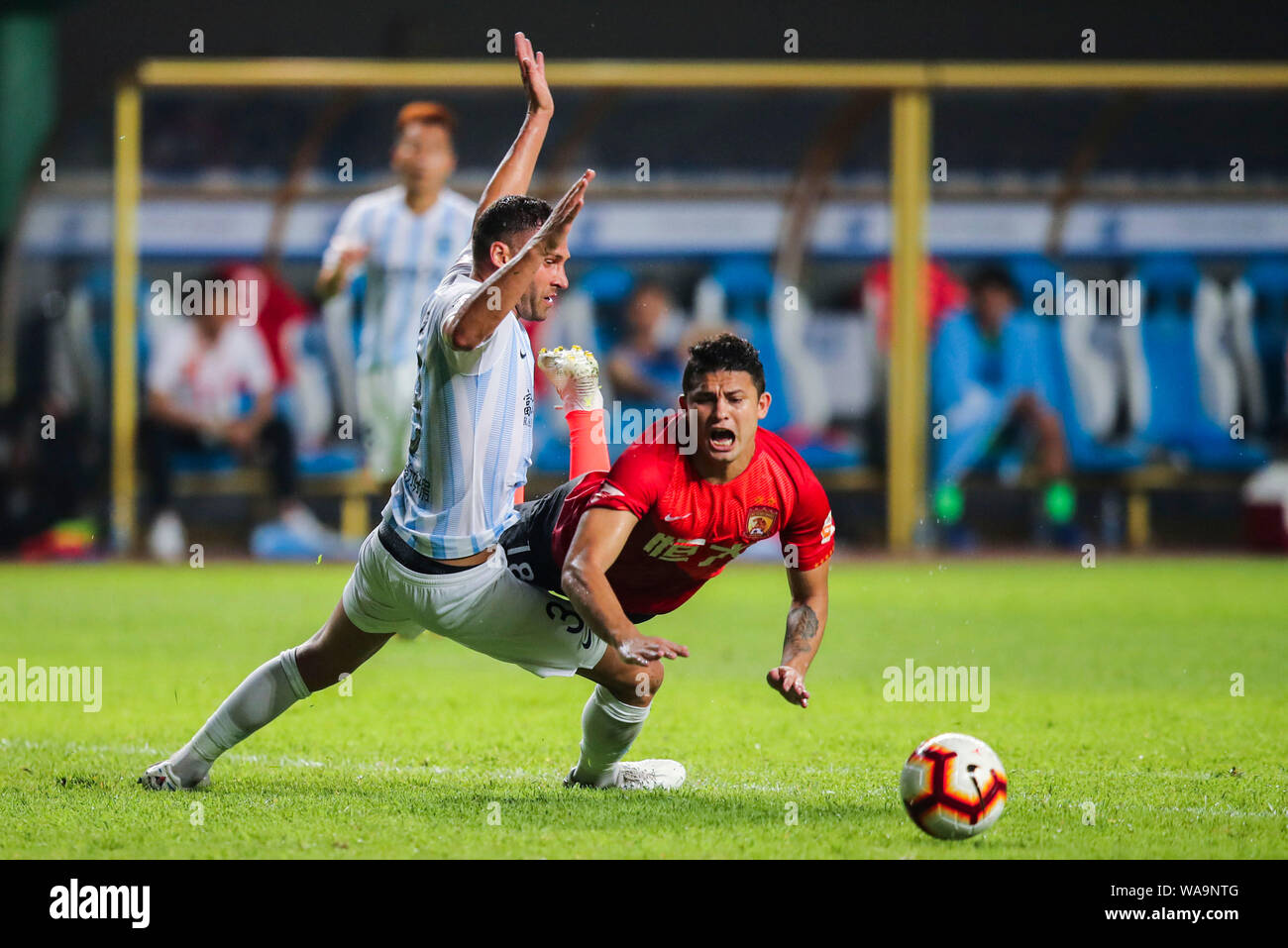Serbian football player Dusko Tosic of Guangzhou R&F F.C. defend ...