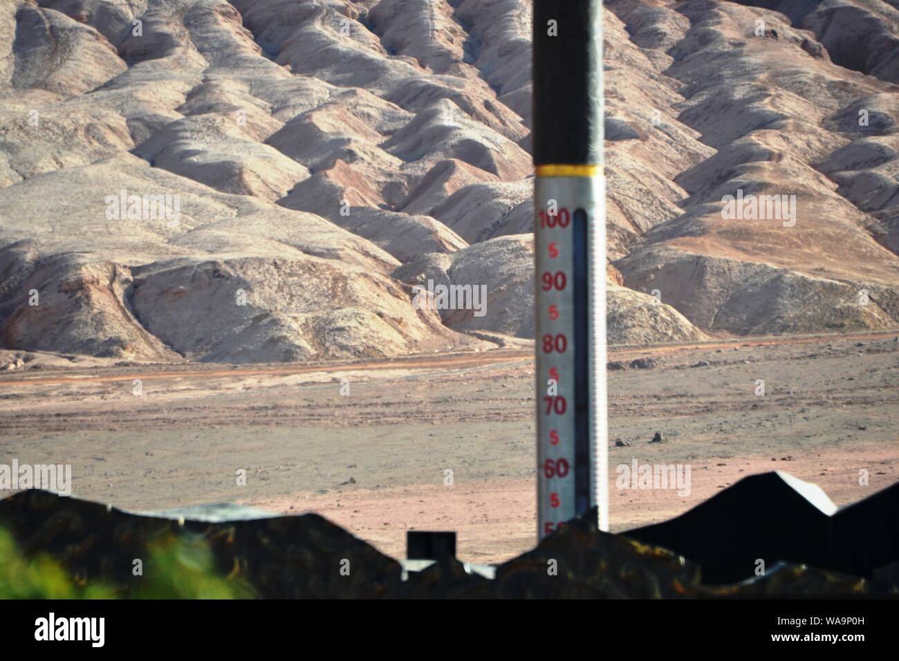 A giant thermometer showing the current outdoor temperature reaching ...