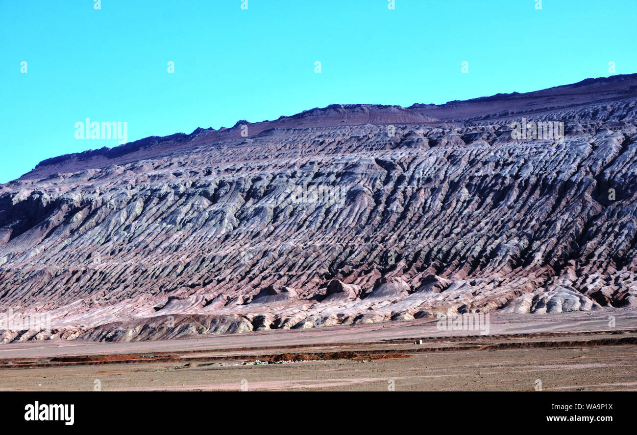 Landscape of the foot of the Huoyan (Flaming) Mountain in Turpan Basin ...