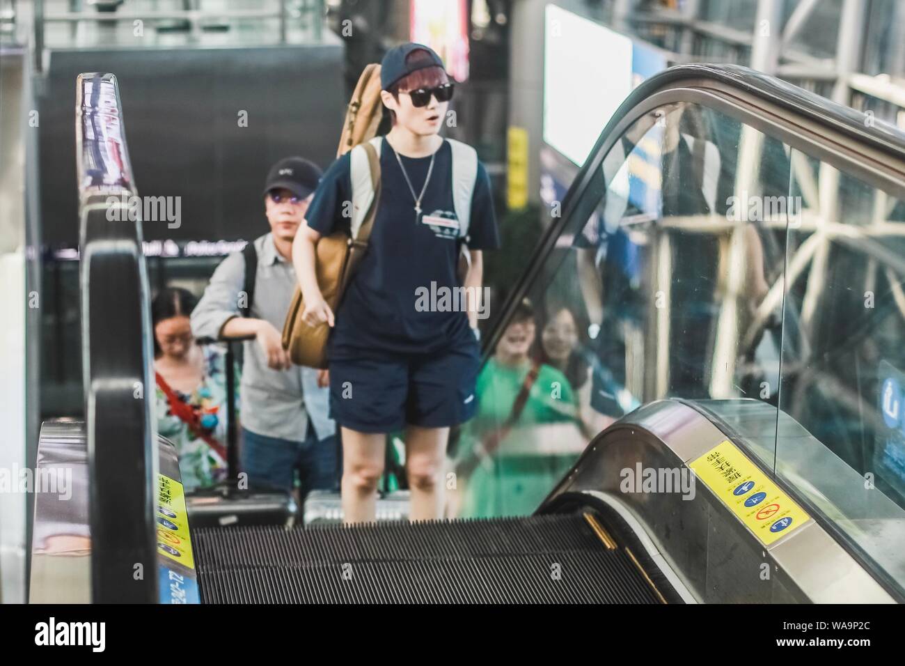 Chinese singer Chris Lee or Li Yuchun arrives at the Chengdu Shuangliu ...