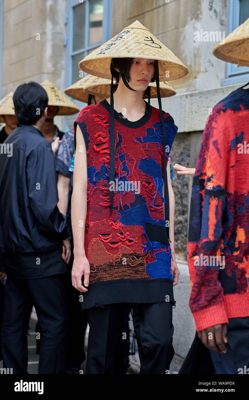 Models are pictured backstage after finishing hair and makeup at the ...