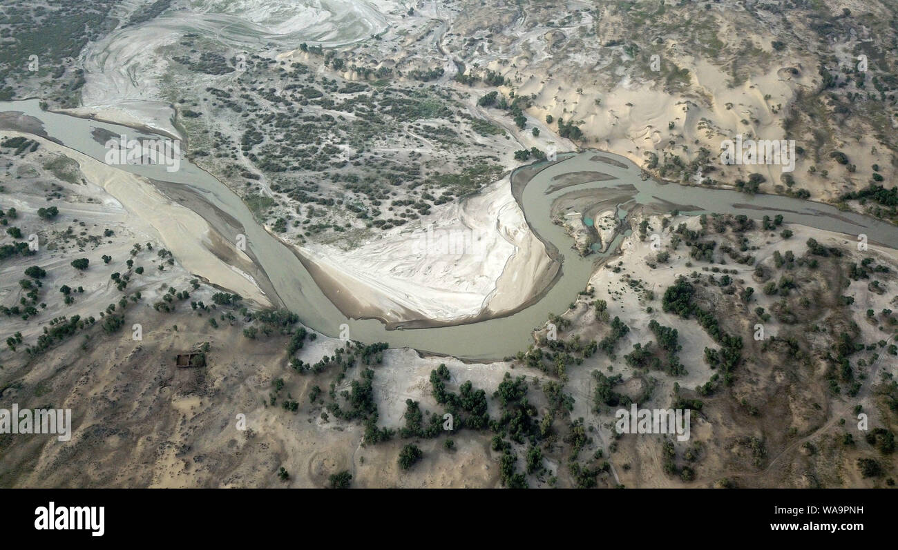 Landscape of the Tarim River embraced by green plants in Yuli county ...