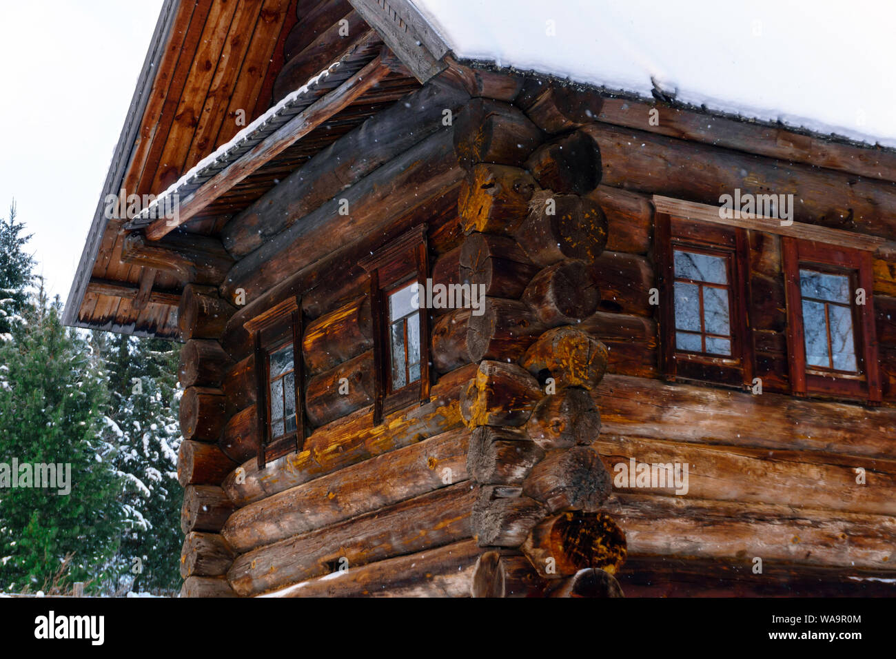 old log Russian peasant hut izba against winter sky Stock Photo - Alamy