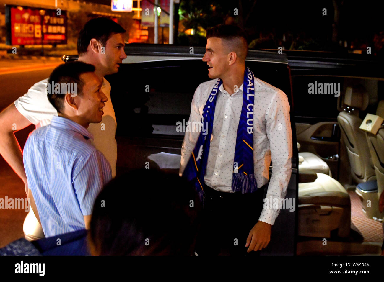 Croatian football player Ivan Santini, top, of China's Jiangsu Suning F ...