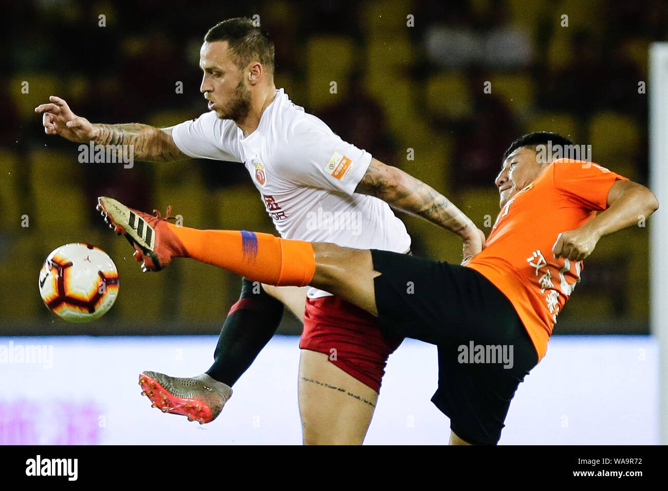 Austrian football player Marko Arnautovic, left, of Shanghai SIPG ...