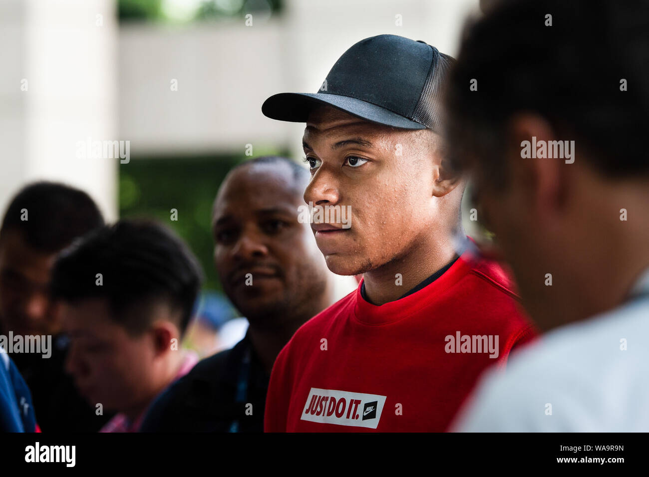 Kylian Mbappe of Paris Saint-Germain F.C. poses after arriving at a ...
