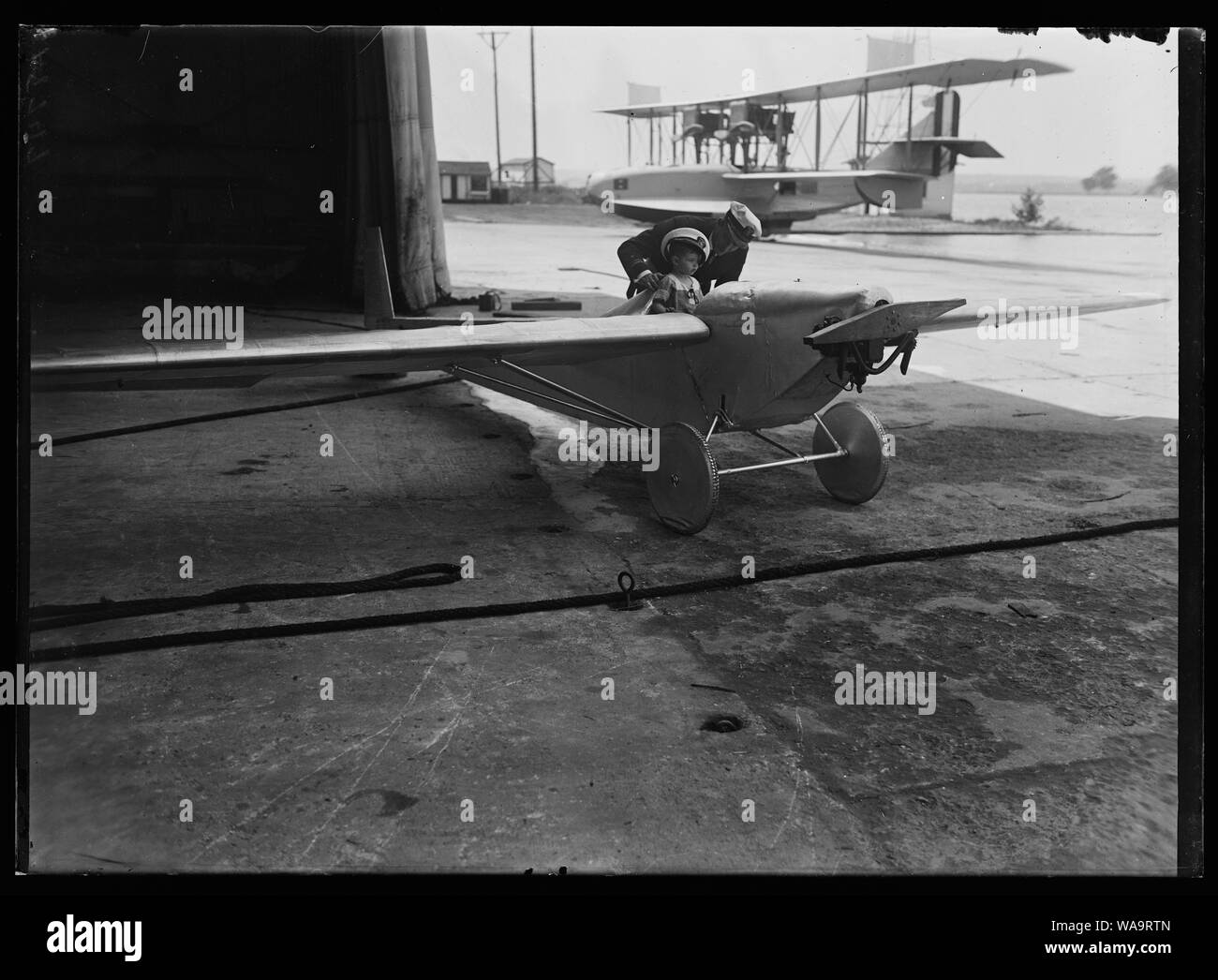 Child in airplane Black and White Stock Photos & Images - Alamy