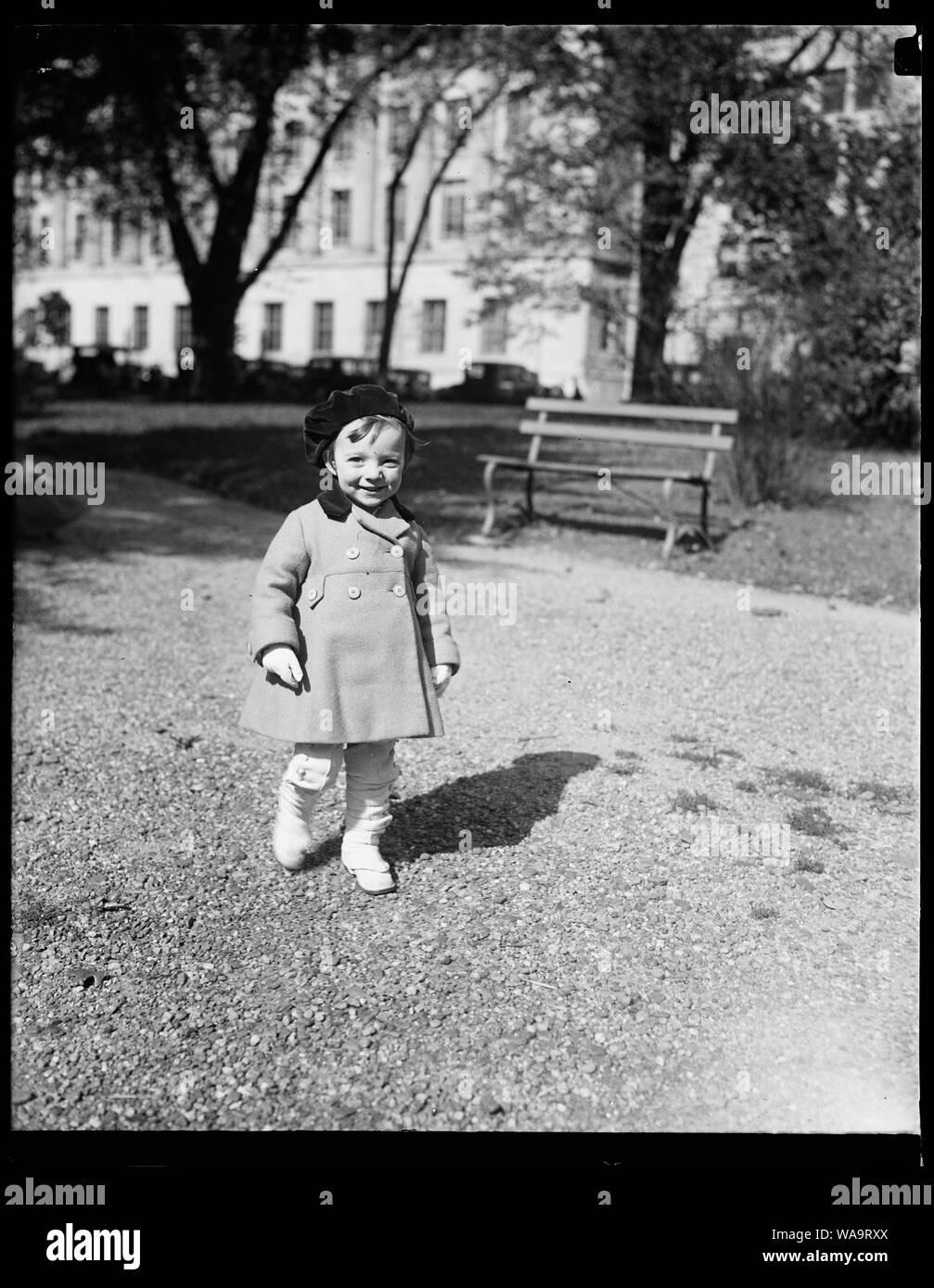 Seating child Black and White Stock Photos & Images - Alamy