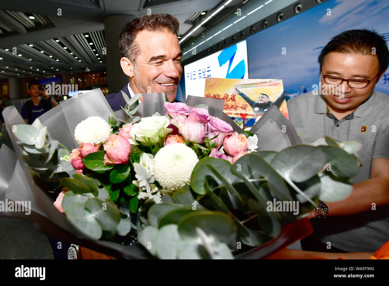 Spanish football manager Luis Garcia of Beijing Renhe F.C. arrives at ...