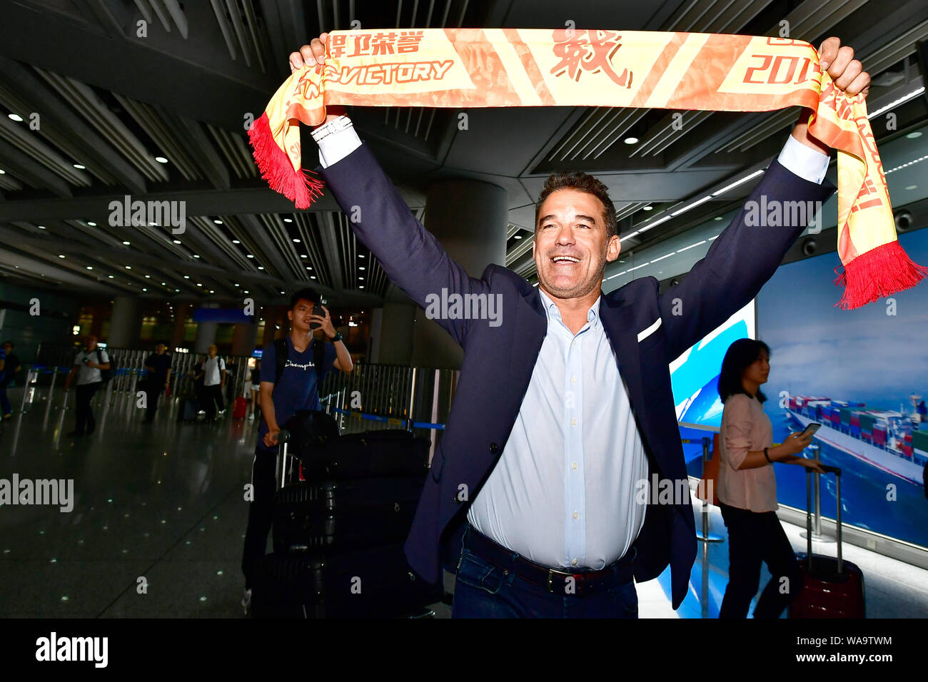Spanish football manager Luis Garcia of Beijing Renhe F.C. arrives at ...