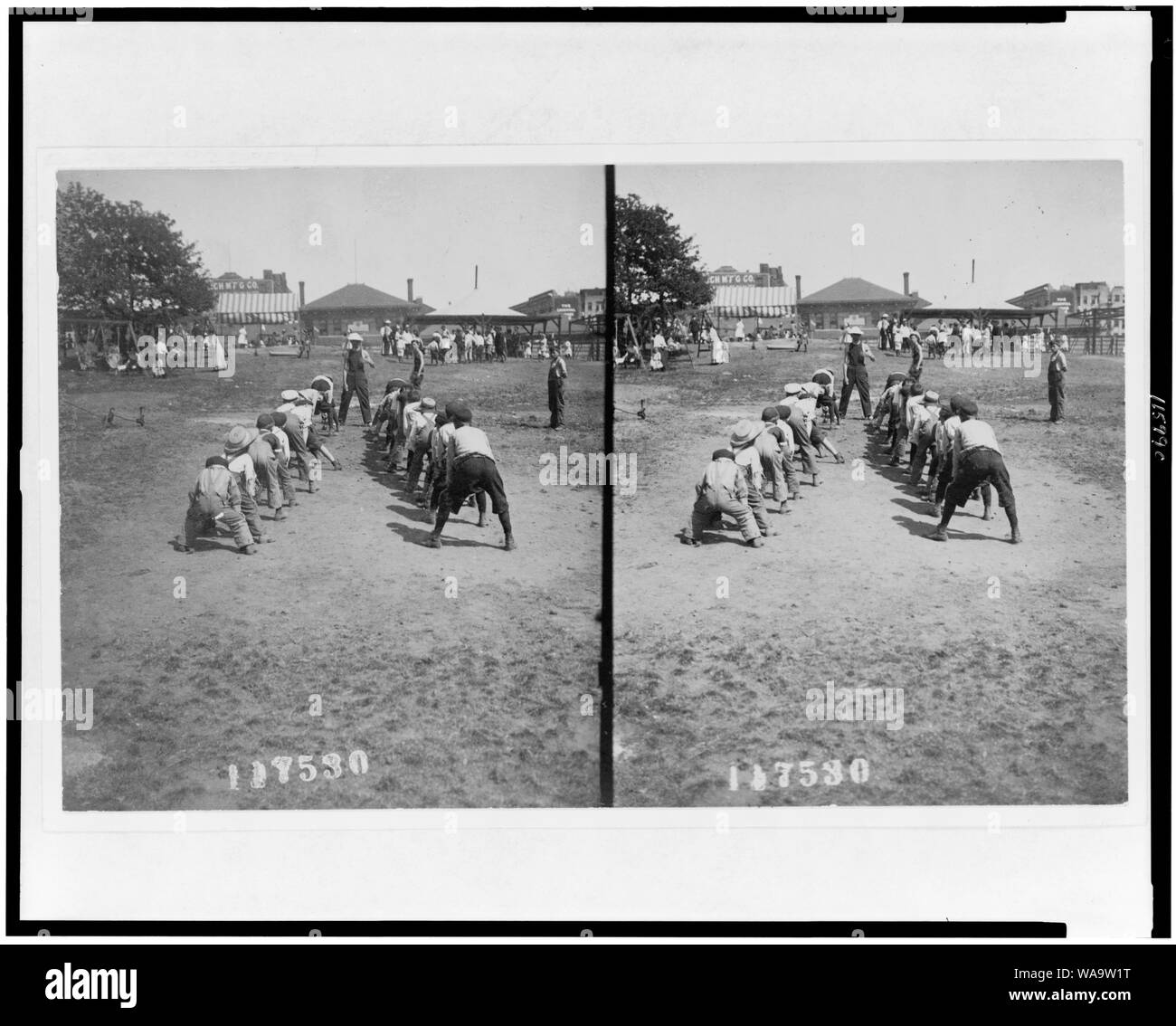 Children forming two lines on a playground Stock Photo - Alamy