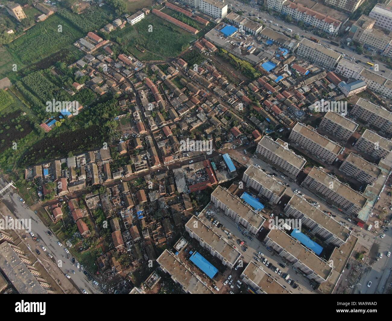 Aerial view of the debris of factory buildings devastated by strong ...