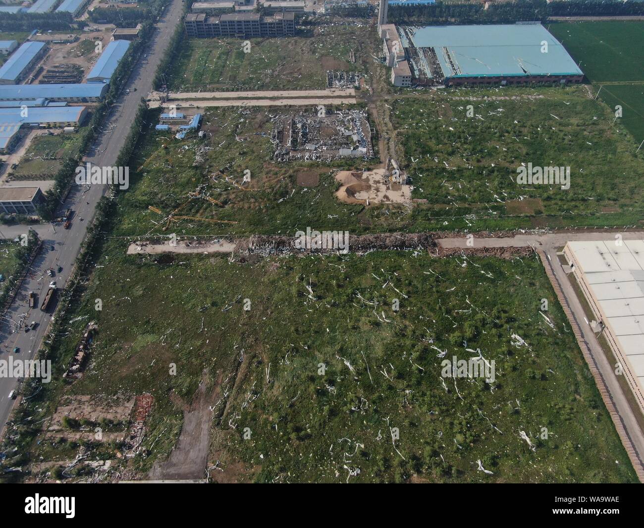 Aerial view of the debris of factory buildings devastated by strong ...