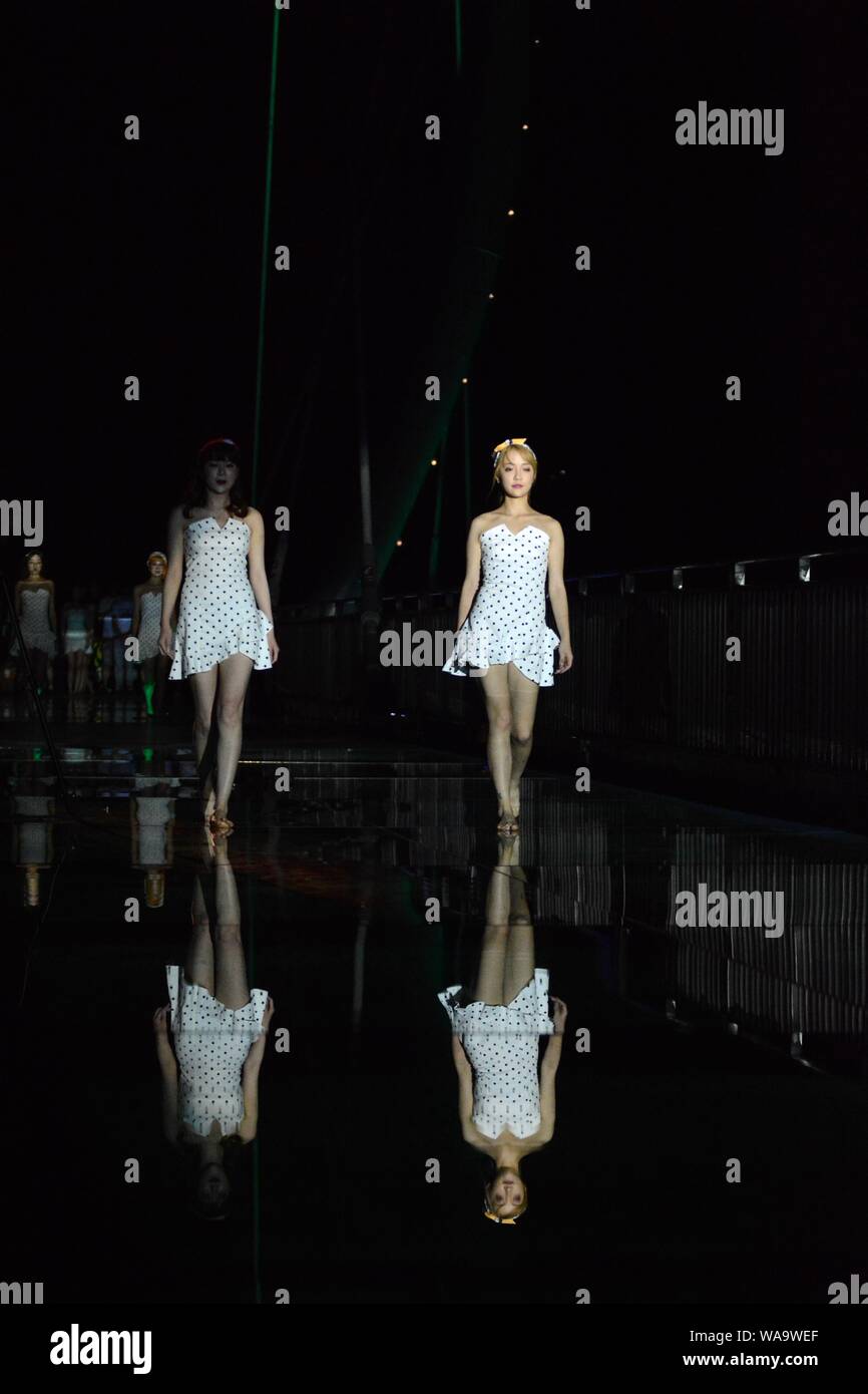 Models display new creations on Guangdong's highest circular glass ...