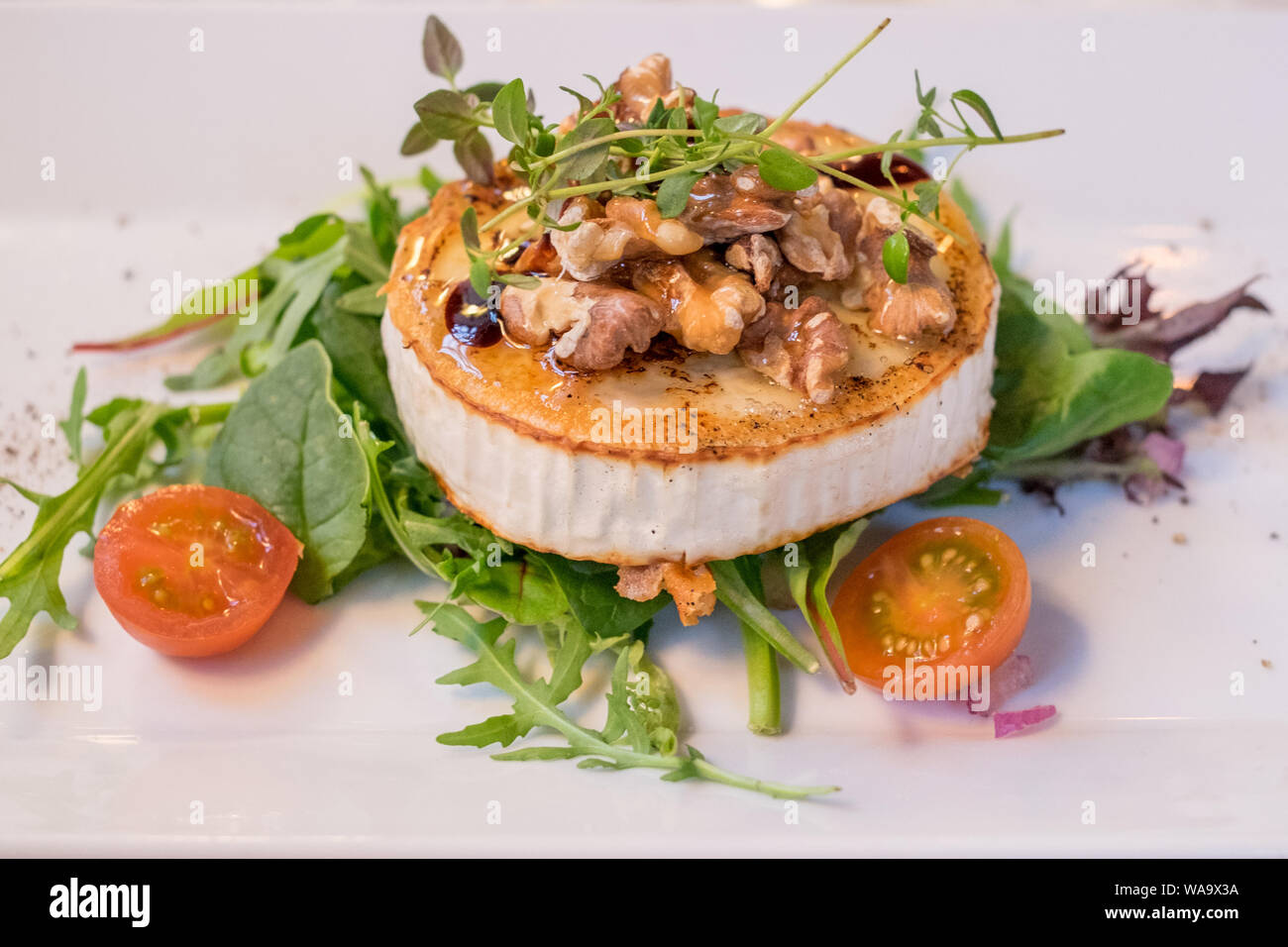 Tomatoes ruccola plate hi-res stock photography and images - Alamy