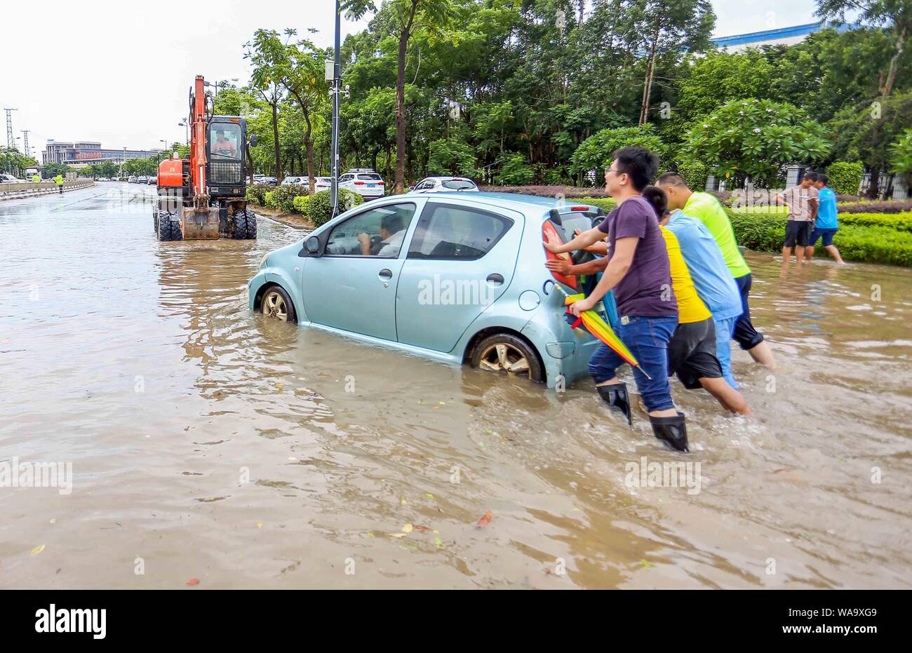 Push car in flood hi-res stock photography and images - Alamy