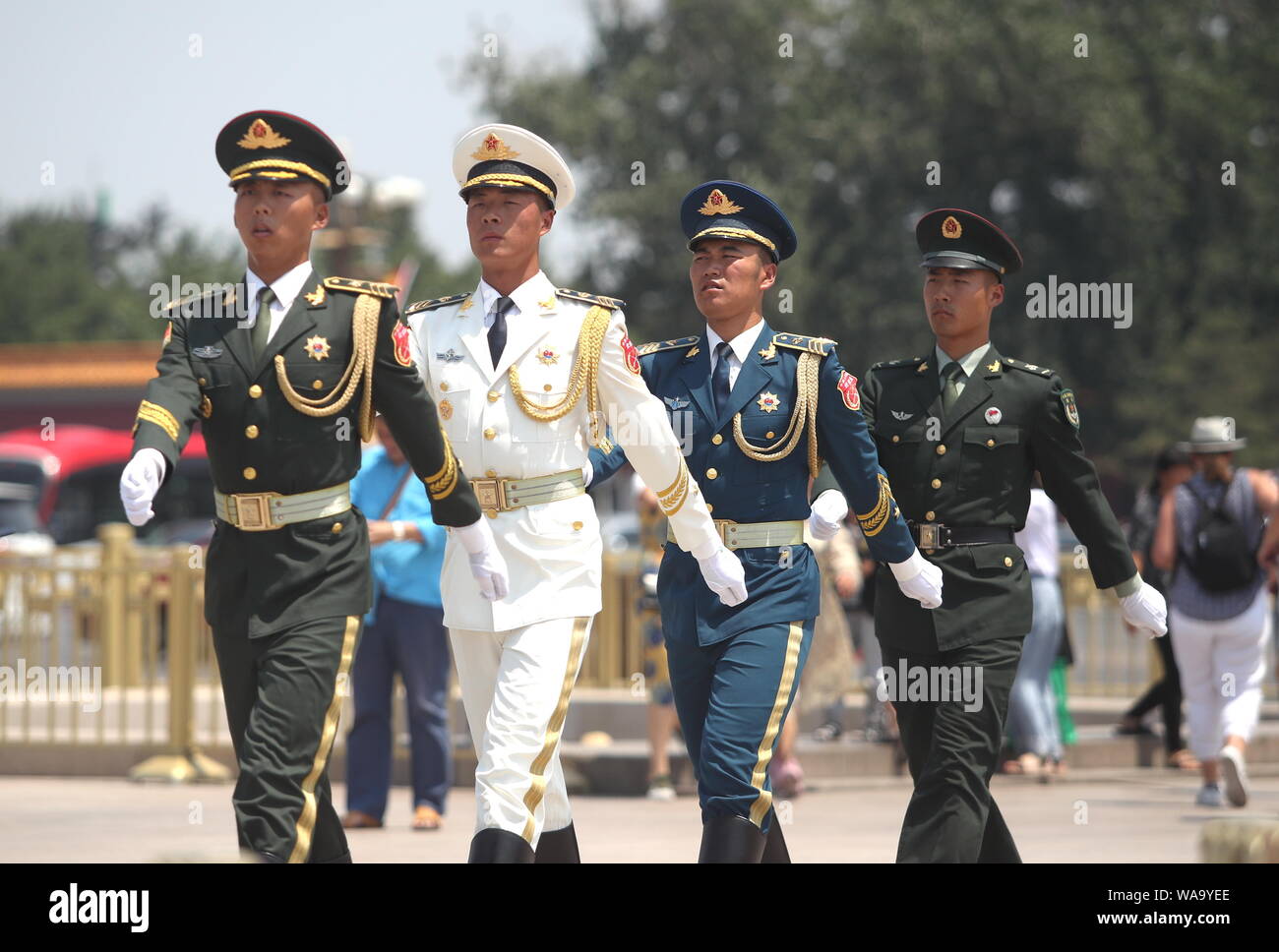 Chinese paramilitary policemen patrol the Tian'anmen Square on a ...